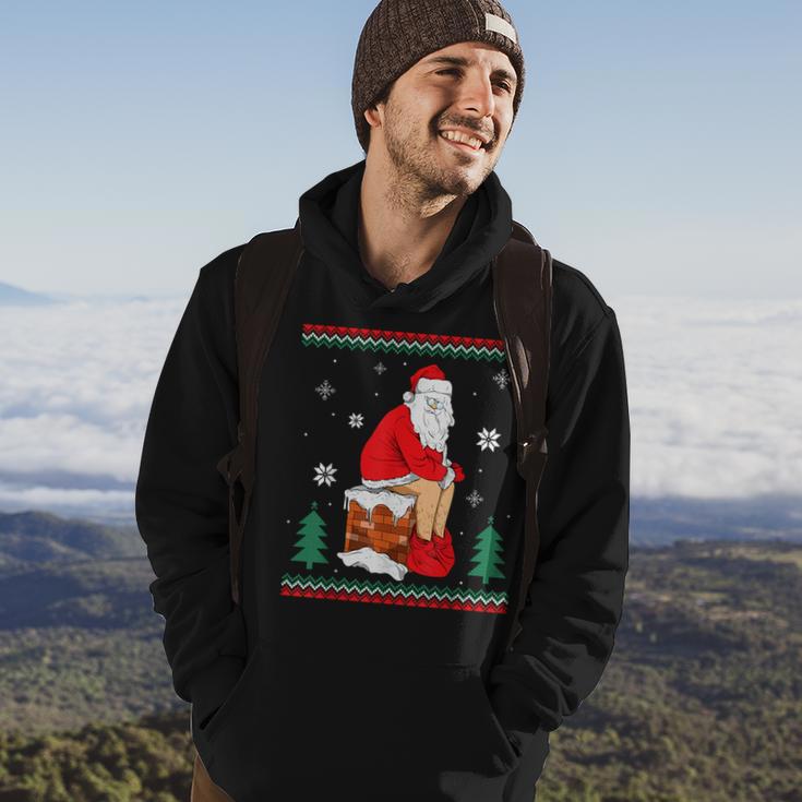 Santa Pooping Down The Chimney Ugly Sweater Christmas Hoodie | Mazezy